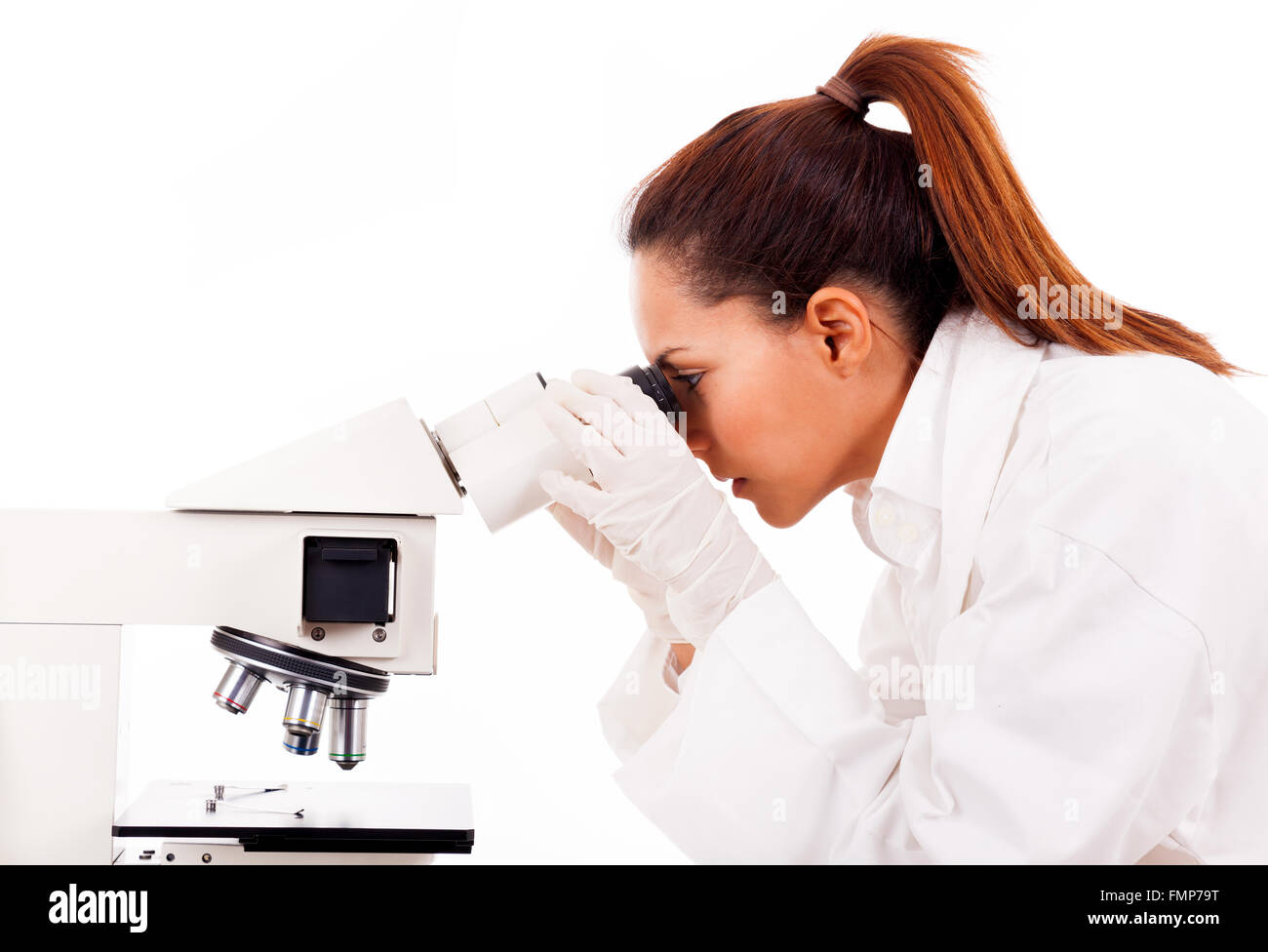 Female researcher looking through microscope, isolated on white Stock ...