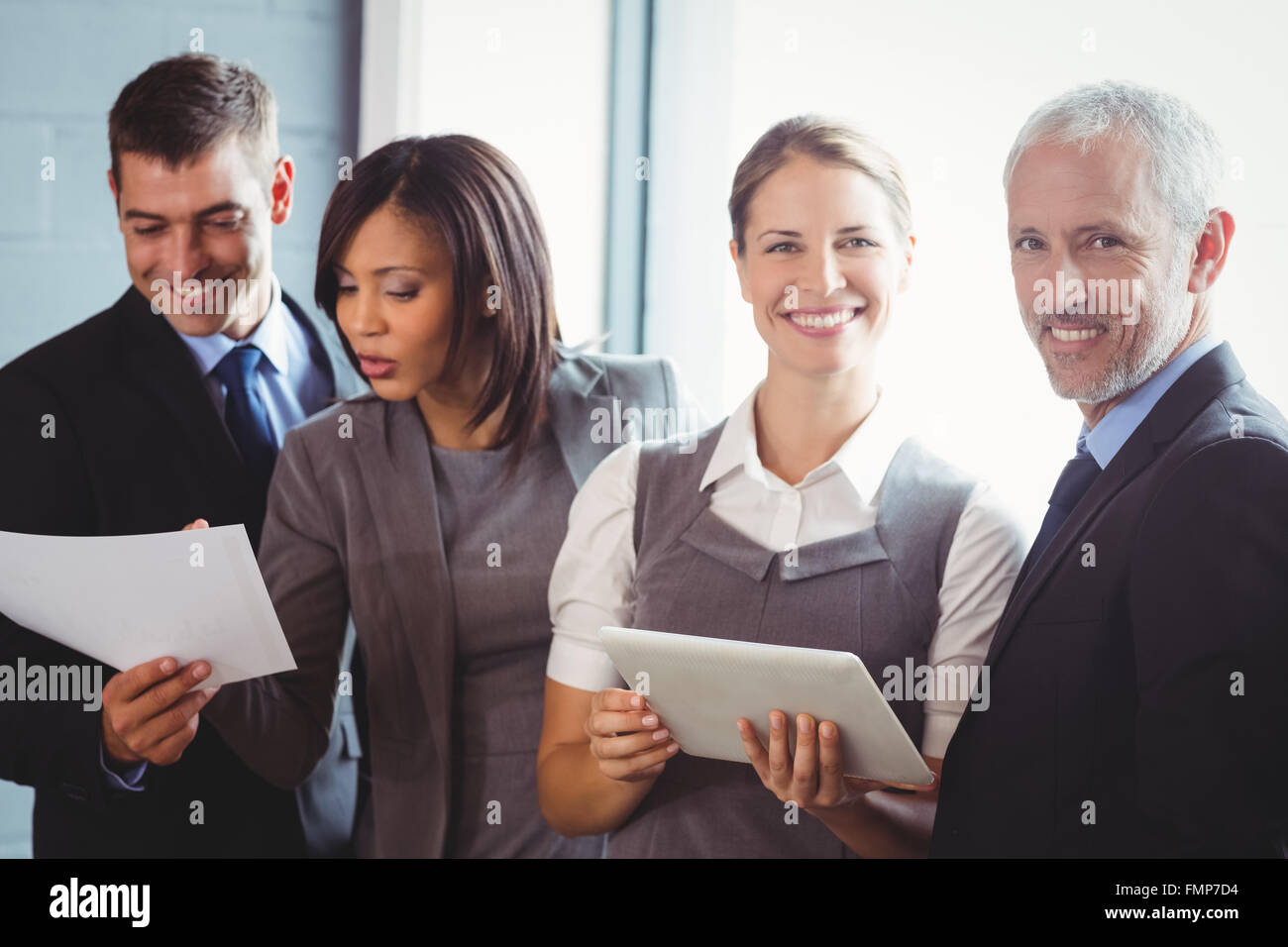 Businesspeople working in office Stock Photo - Alamy