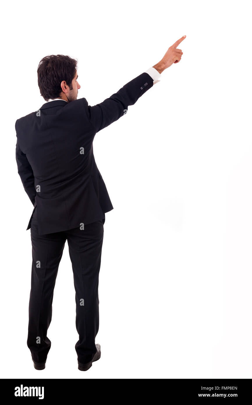 Young male business man pointing over white background Stock Photo - Alamy