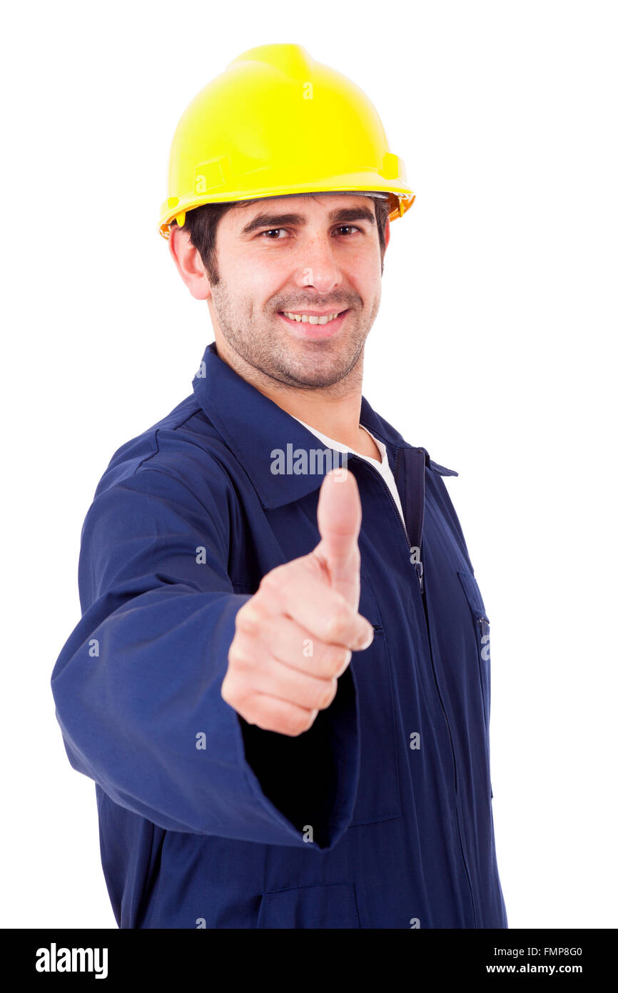 Smiling young builder thumbs up on white background Stock Photo - Alamy
