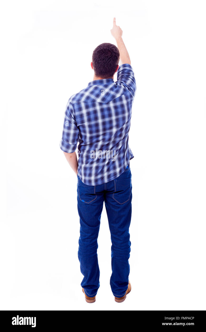 Back view of young man pointing up, isolated over white background ...