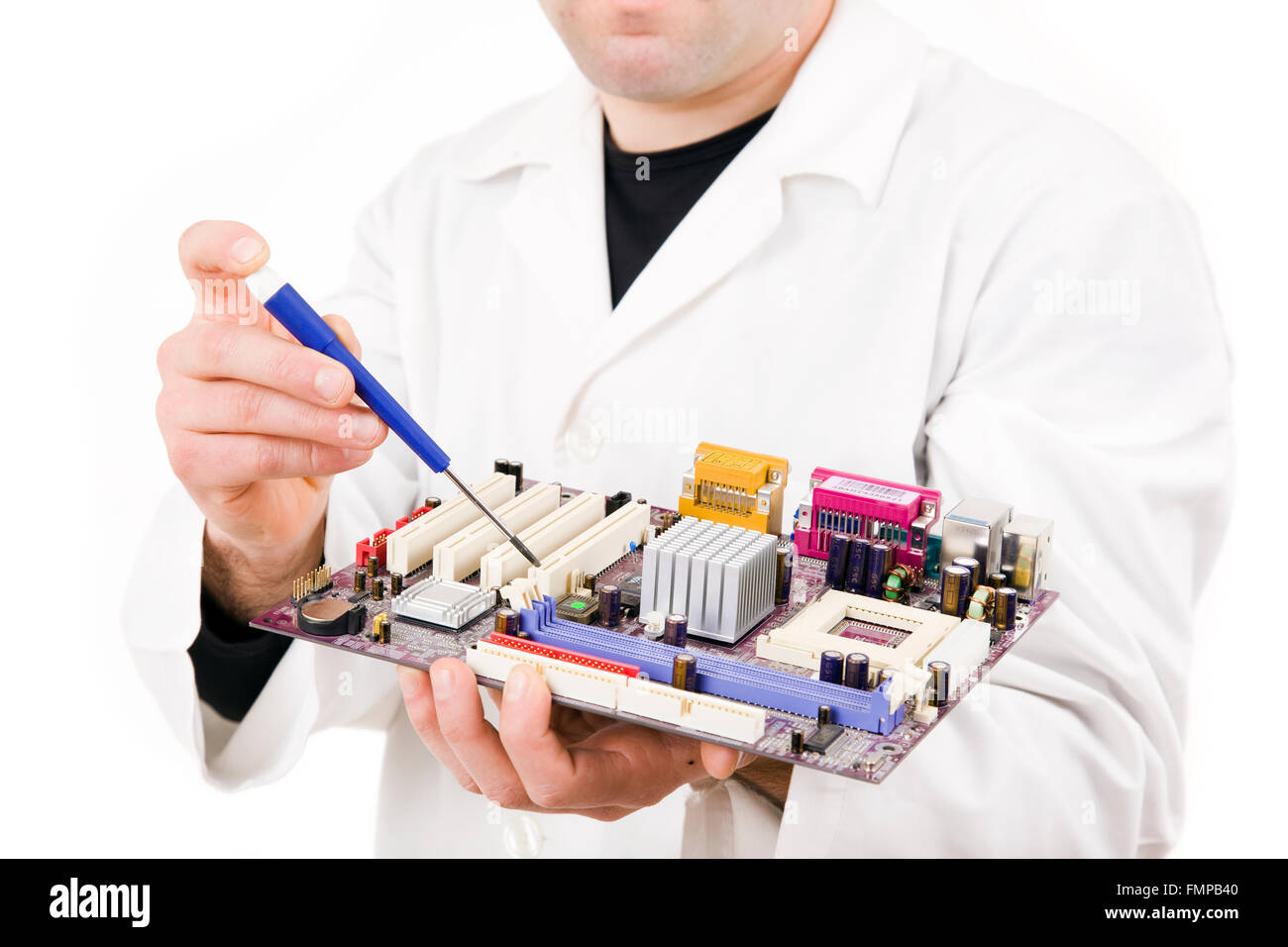 Computer Engineer examining/repairing a electronic circuit, isolated ...