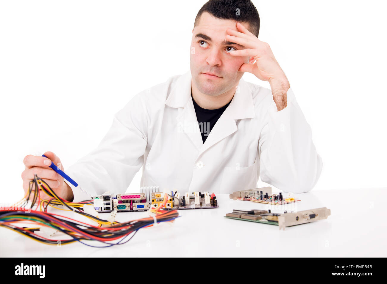 Pensive Computer Engineer on white background Stock Photo - Alamy