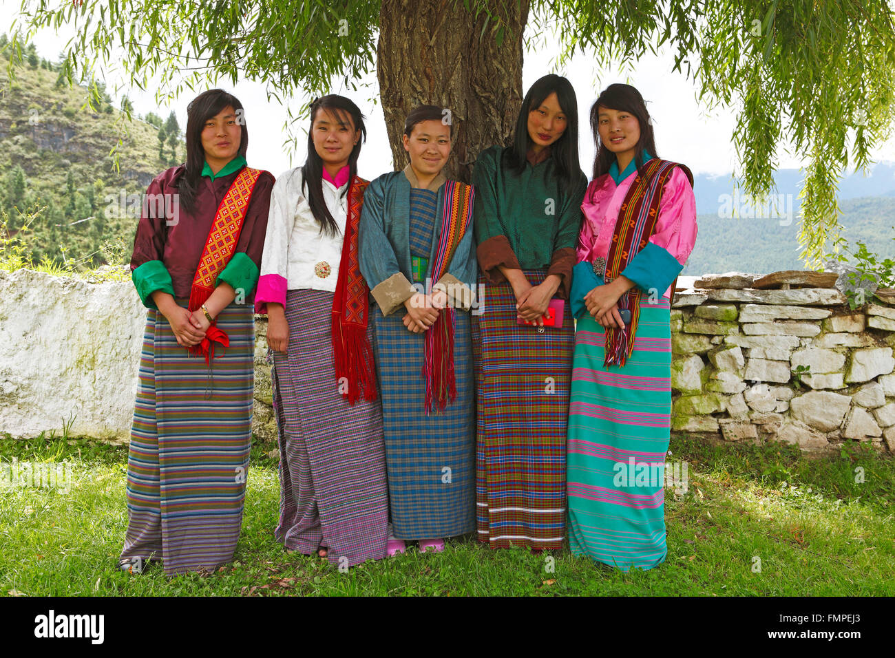 Young women wearing colorful Kira dresses, Paro district, Bhutan Stock ...