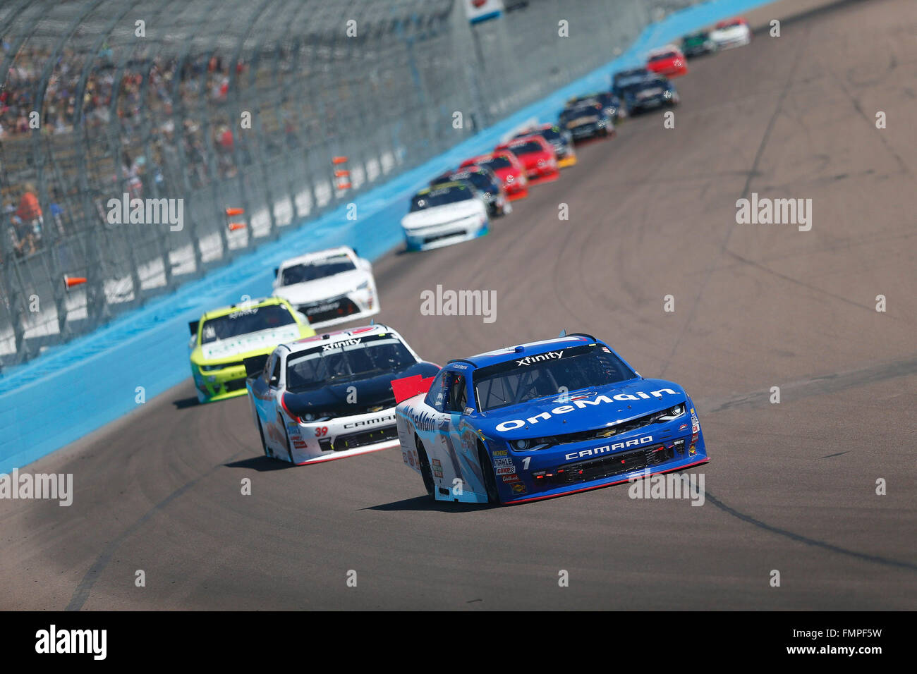 Avondale, AZ, USA. 12th Mar, 2016. Elliott Sadler (1) battles for ...