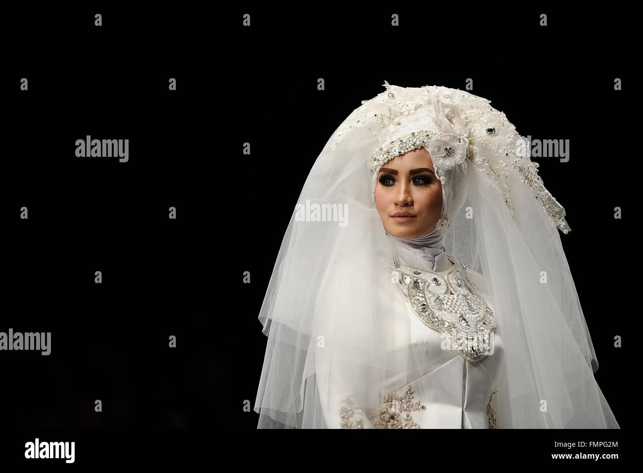 Jakarta, Indonesia. 12th Mar, 2016. A model showcases designs by Ria ...