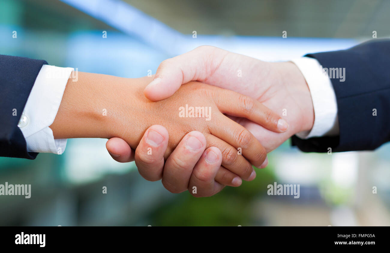 Image of business handshake at the office Stock Photo - Alamy