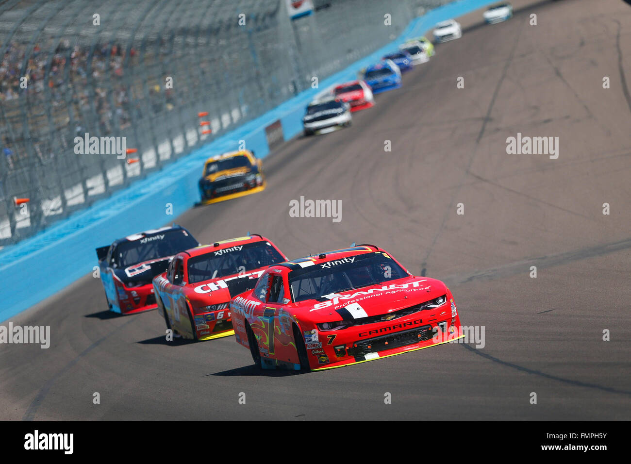 Avondale, AZ, USA. 12th Mar, 2016. Justin Allgaier (7) battles for ...