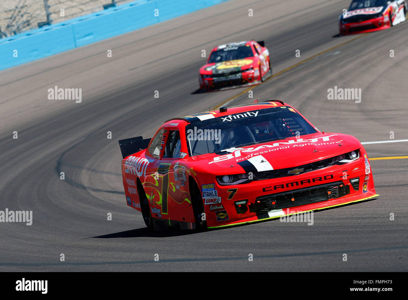 Avondale, AZ, USA. 12th Mar, 2016. Justin Allgaier (7) battles for ...