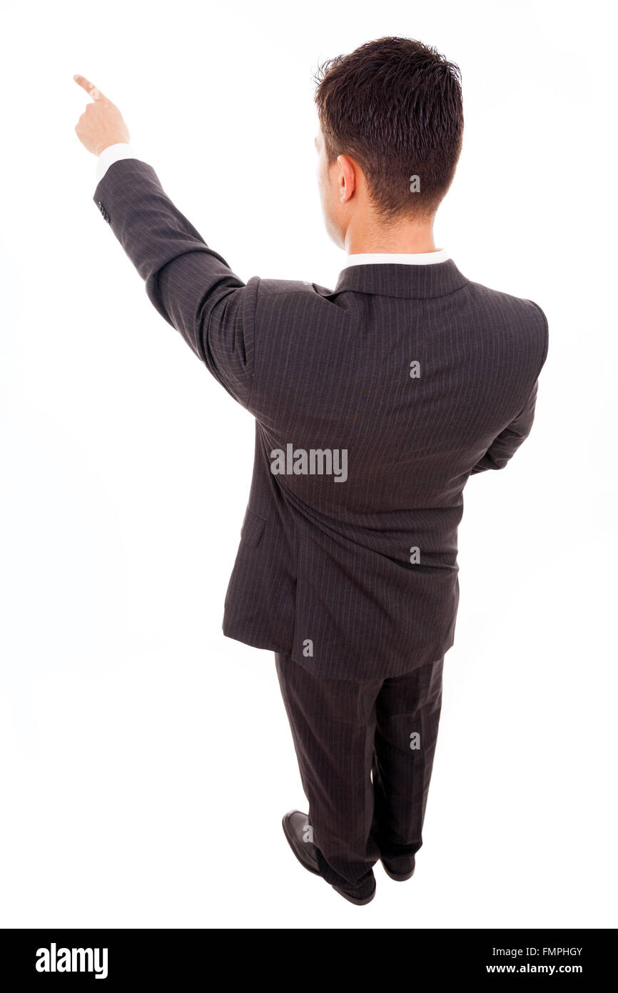 Young business man pointing over white background Stock Photo - Alamy