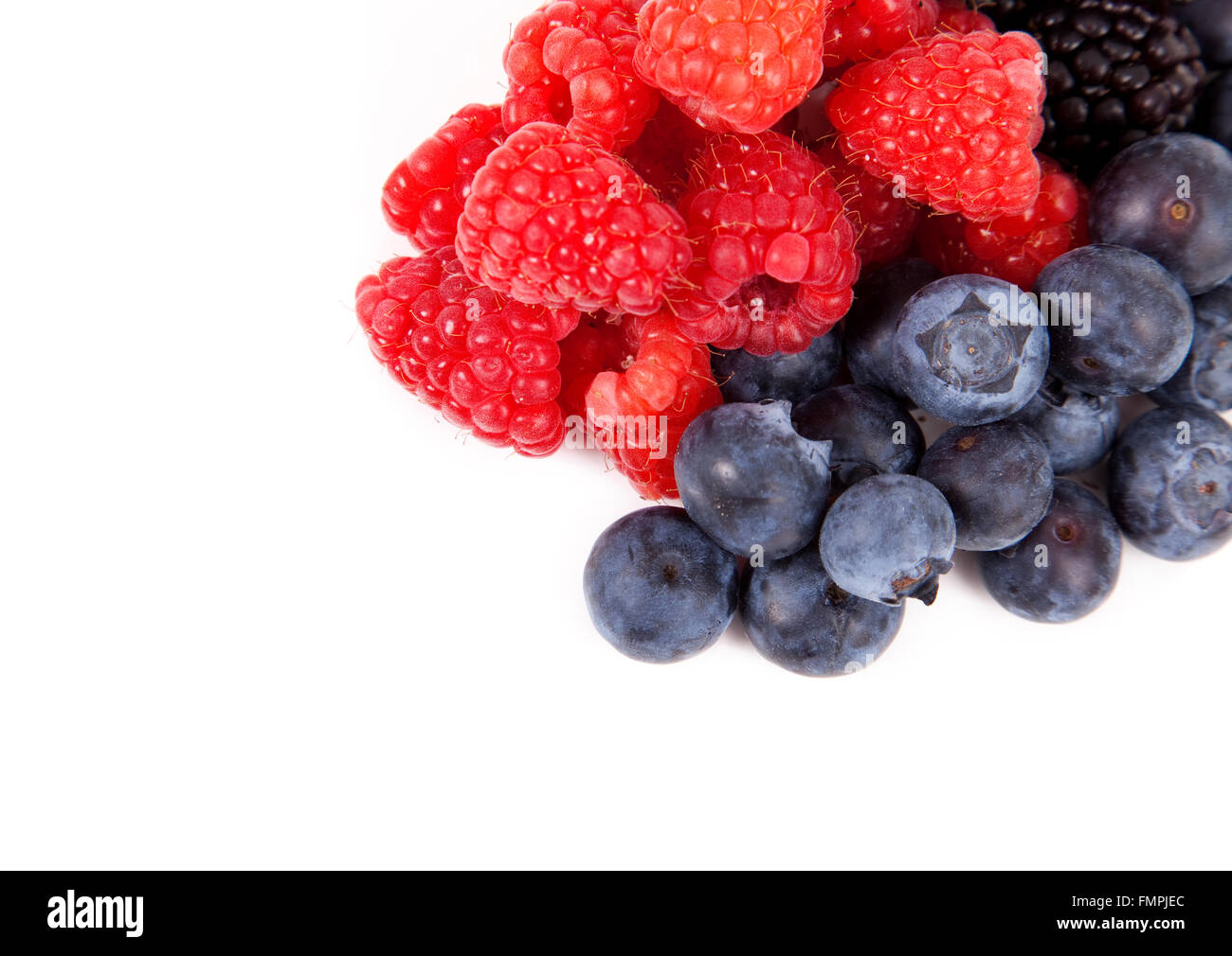 Red fruits closeup, isolated on white background Stock Photo - Alamy