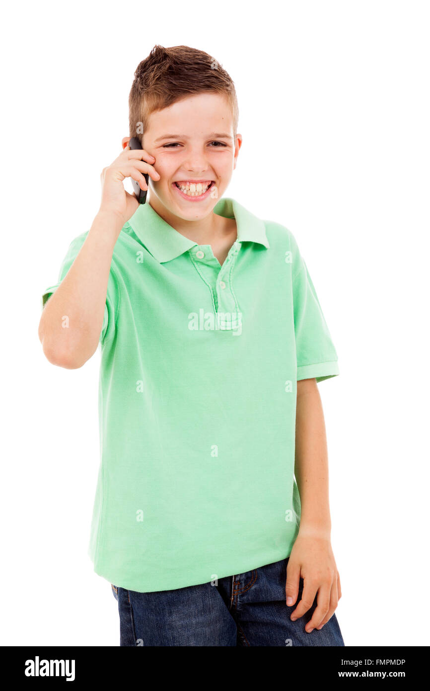 Happy little boy talking on the phone, isolated on white background ...