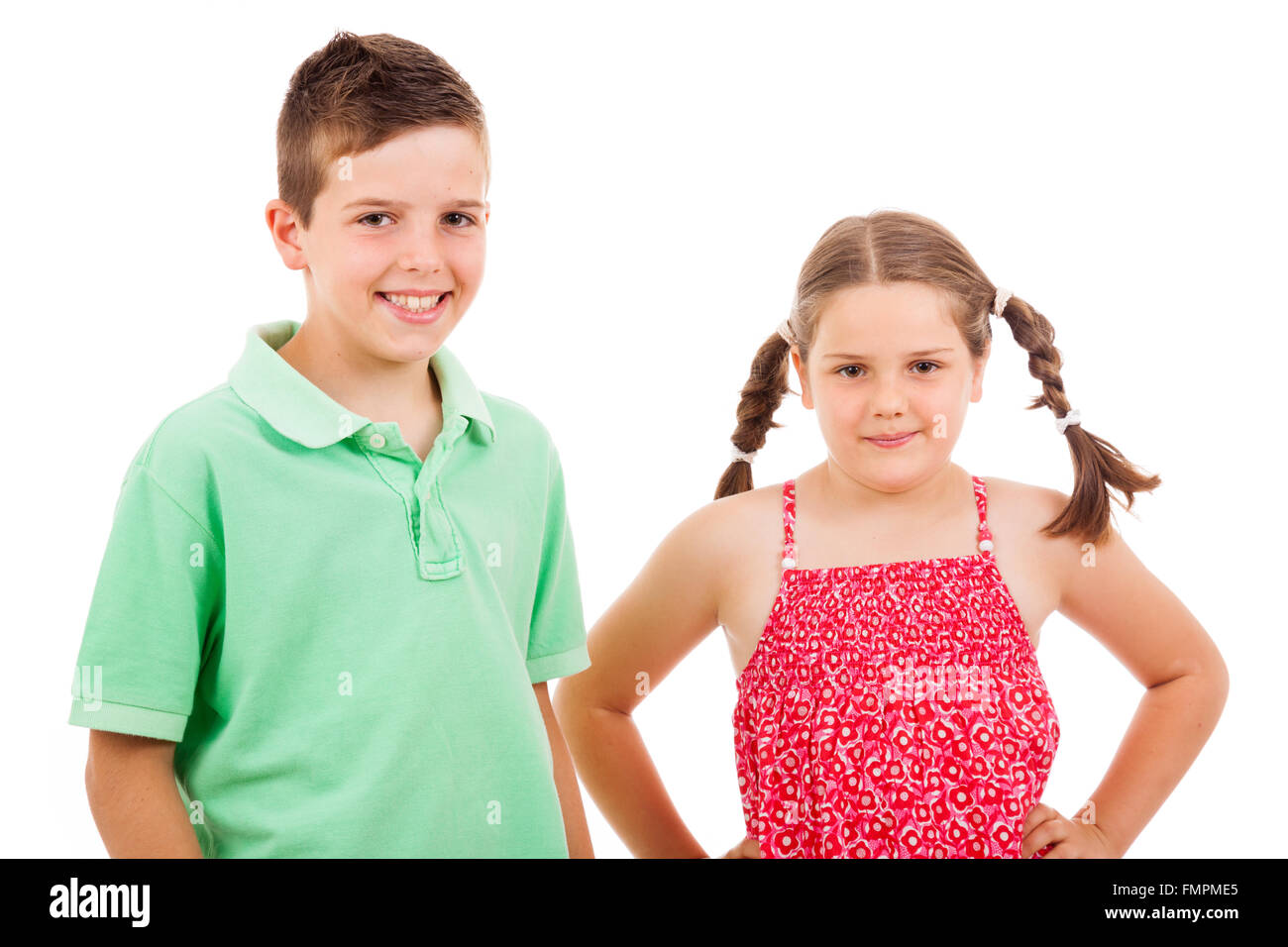 Two children standing over white background Stock Photo - Alamy