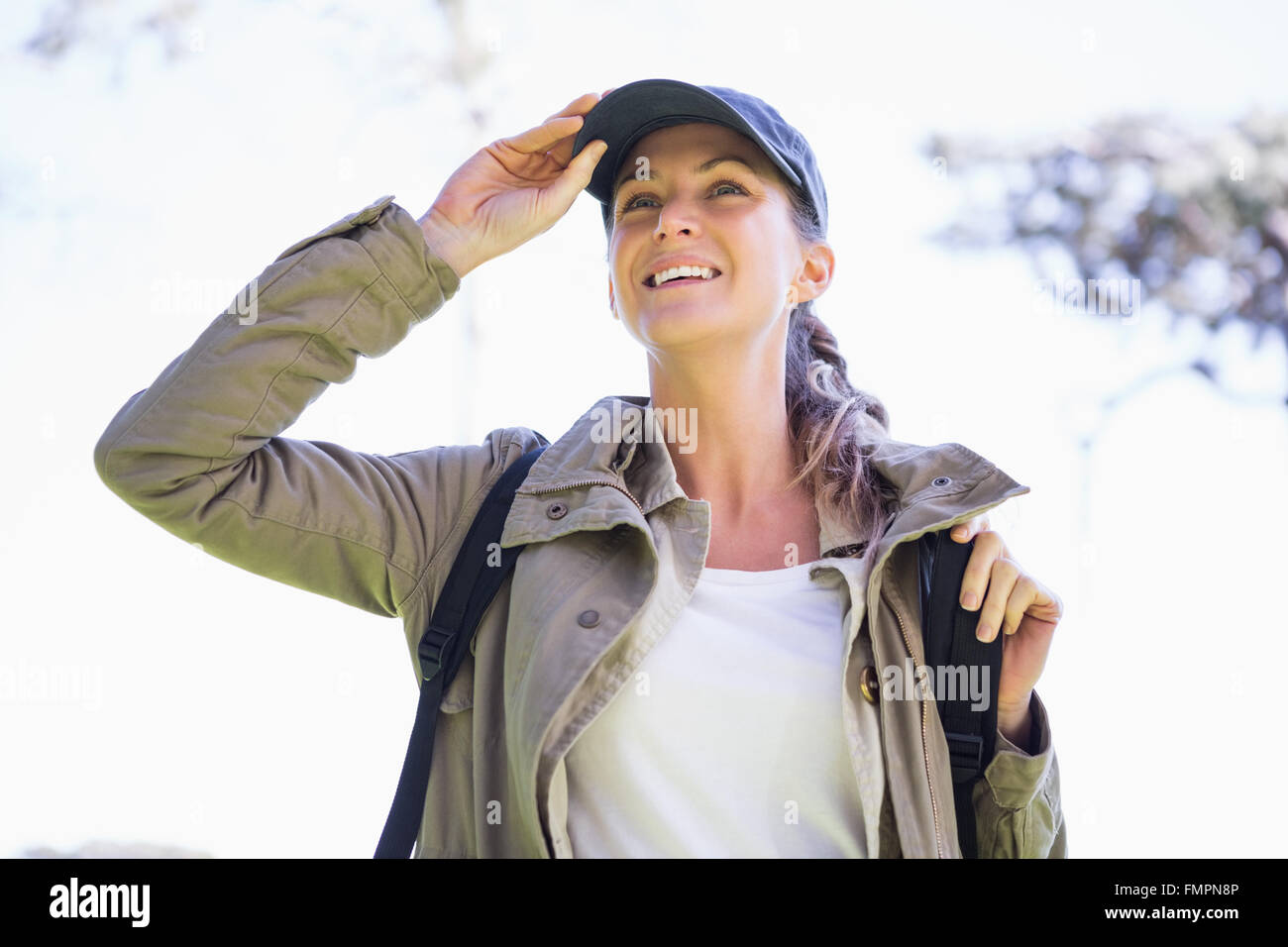 Woman observing something Stock Photo - Alamy
