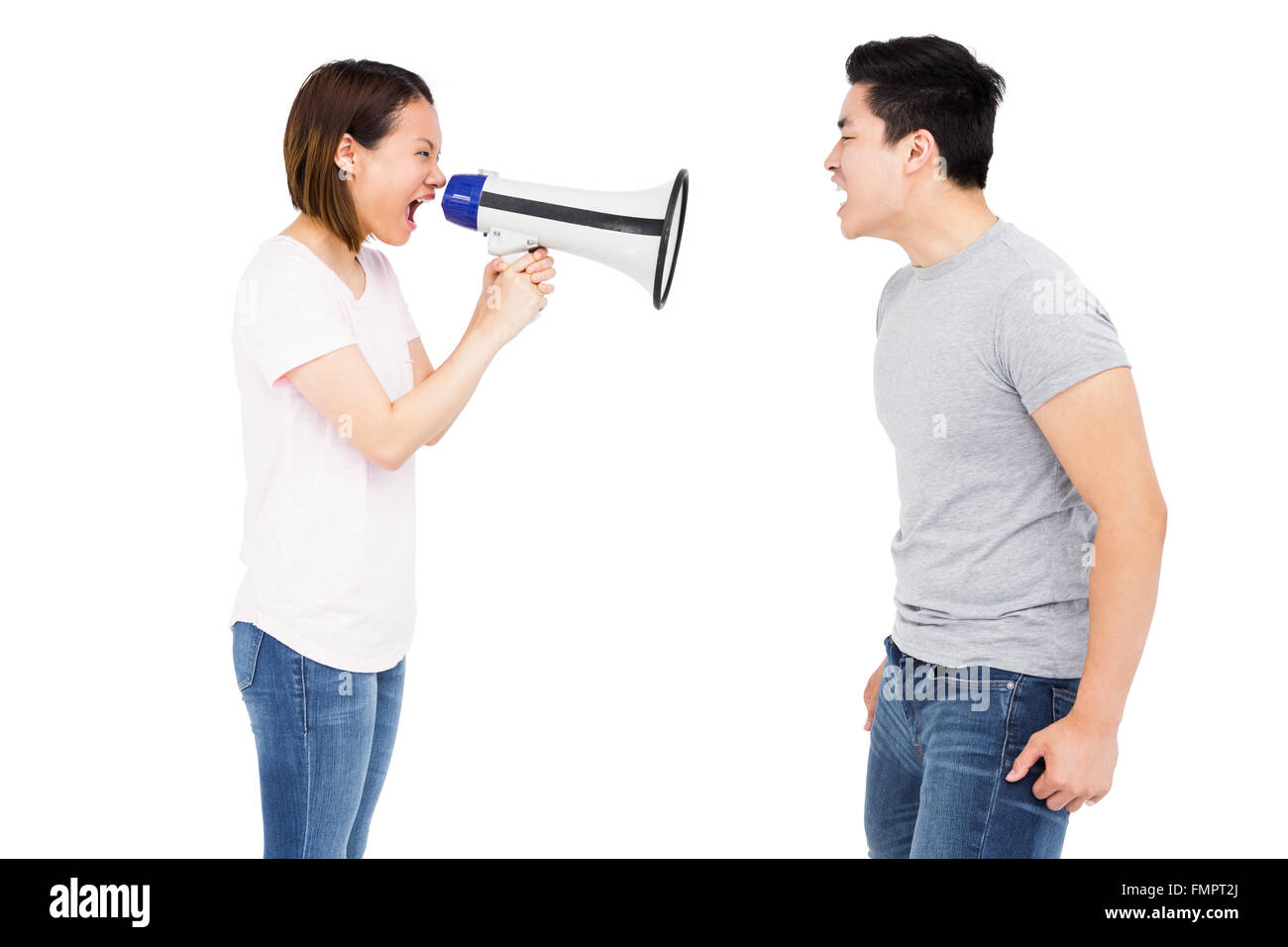 Angry woman shouting at young man on horn loudspeaker Stock Photo - Alamy