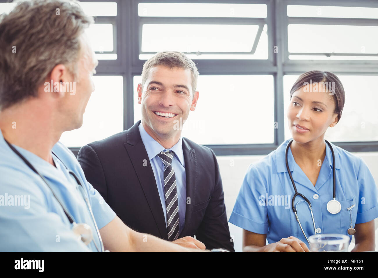 Medical team interacting in conference room Stock Photo - Alamy