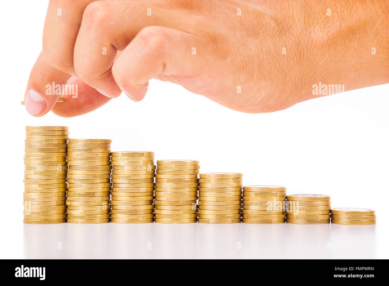 Hand put coin to money staircase , isolated on white Stock Photo - Alamy