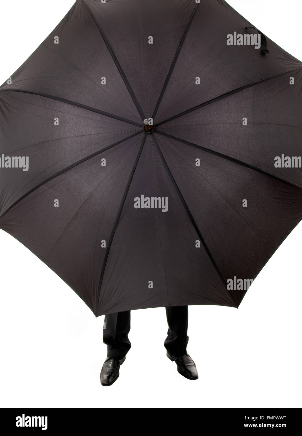 Business man hidden in umbrella against white background Stock Photo ...