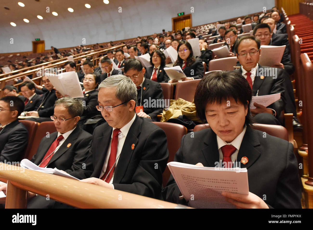 Beijing, China. 13th Mar, 2016. Staff members of the Supreme People's ...