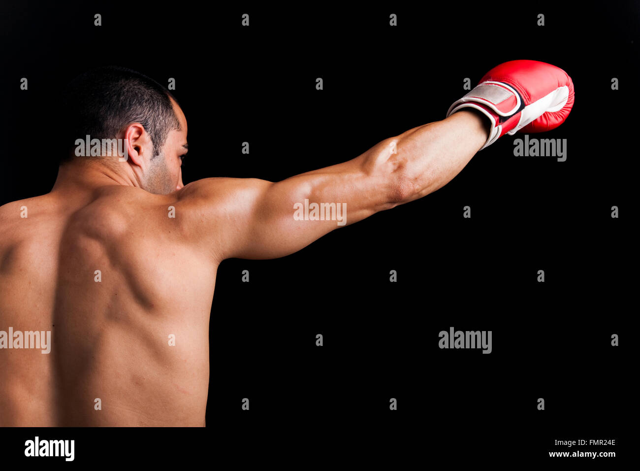 Young Boxer fighter over black background Stock Photo - Alamy