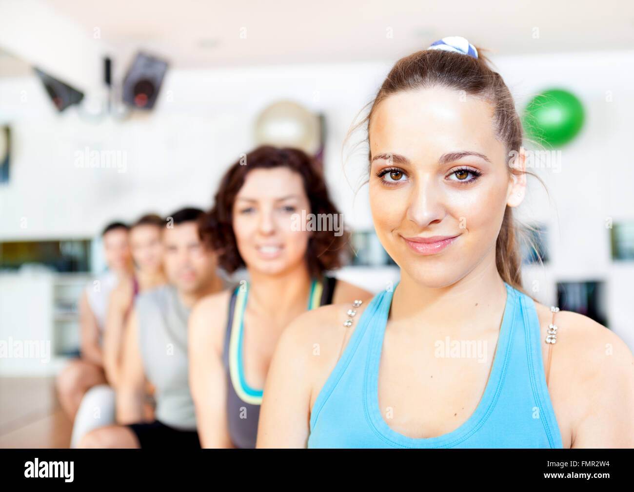 Group of smiling people at the gym Stock Photo - Alamy
