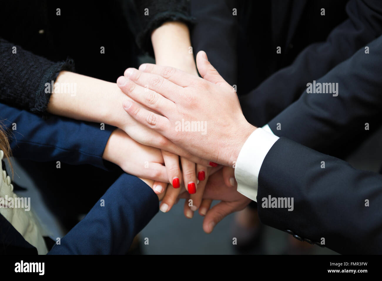 Pile hands business people teamwork team hi-res stock photography and ...