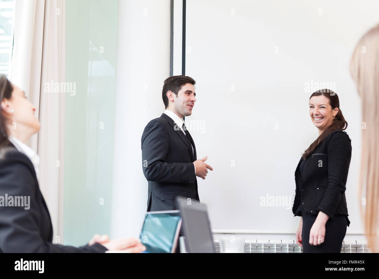 Business people discussing ideas at meeting Stock Photo - Alamy