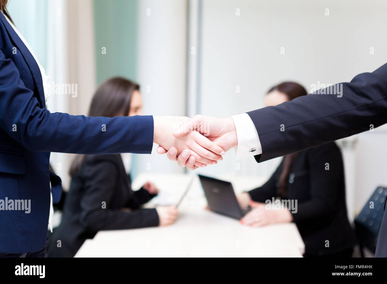 Handshake business people people background hi-res stock photography ...
