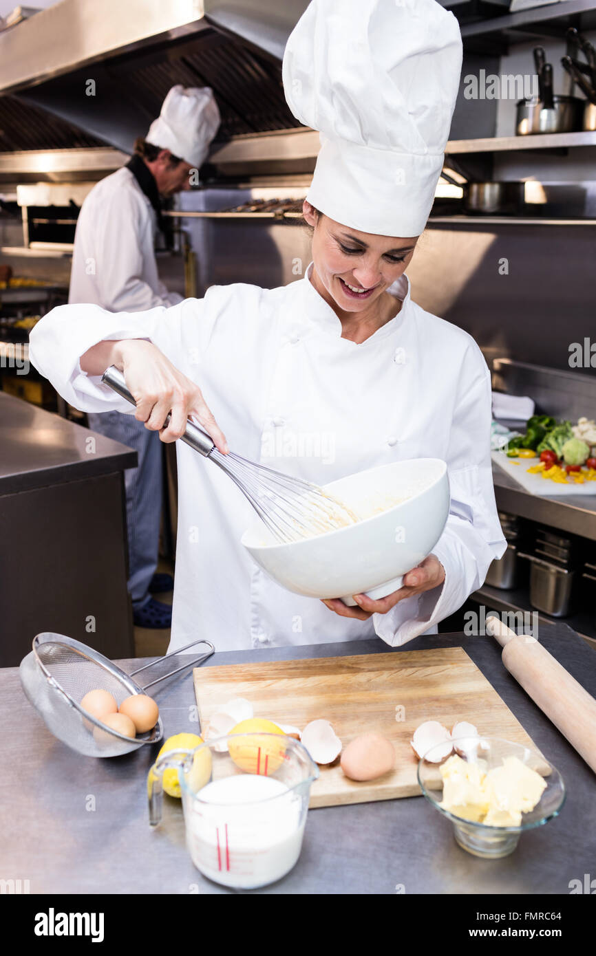 Worker whisking hi-res stock photography and images - Alamy