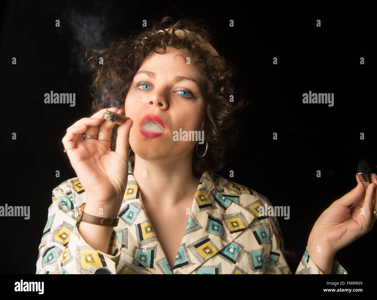 Girl smoking cigar hi-res stock photography and images - Alamy