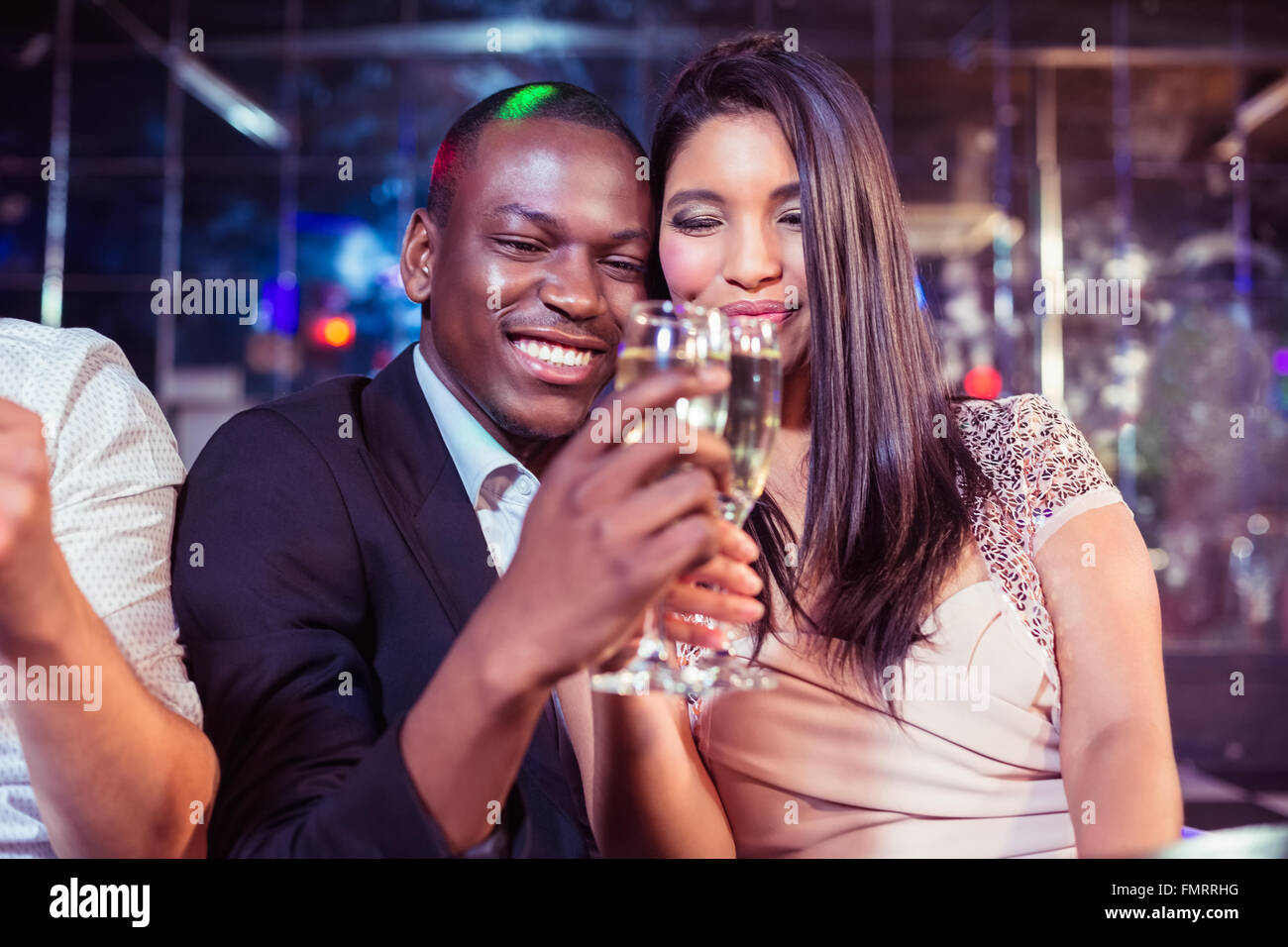 Happy friends toasting with champagne Stock Photo - Alamy