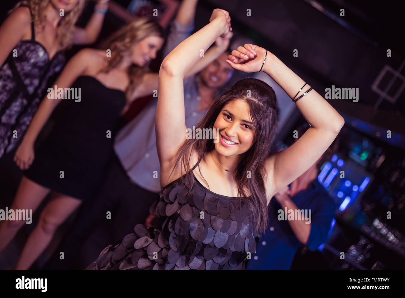 Cute friends having fun and dancing Stock Photo - Alamy