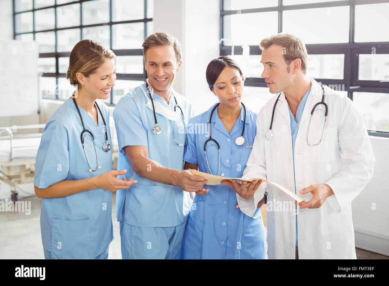 Medical team interacting with each other Stock Photo - Alamy