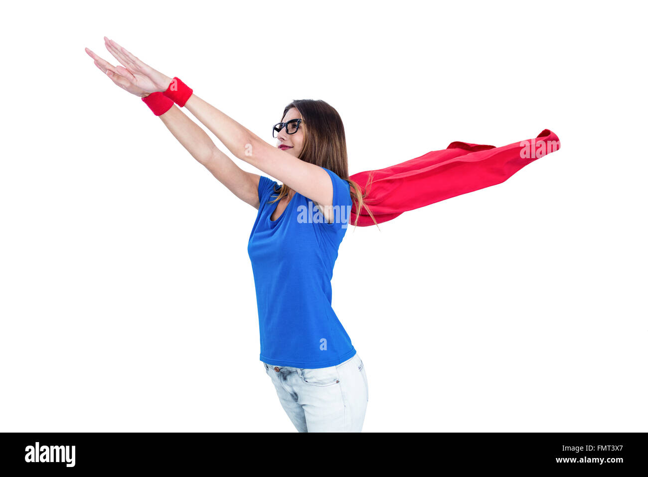 Woman in superhero costume pretending to fly Stock Photo - Alamy