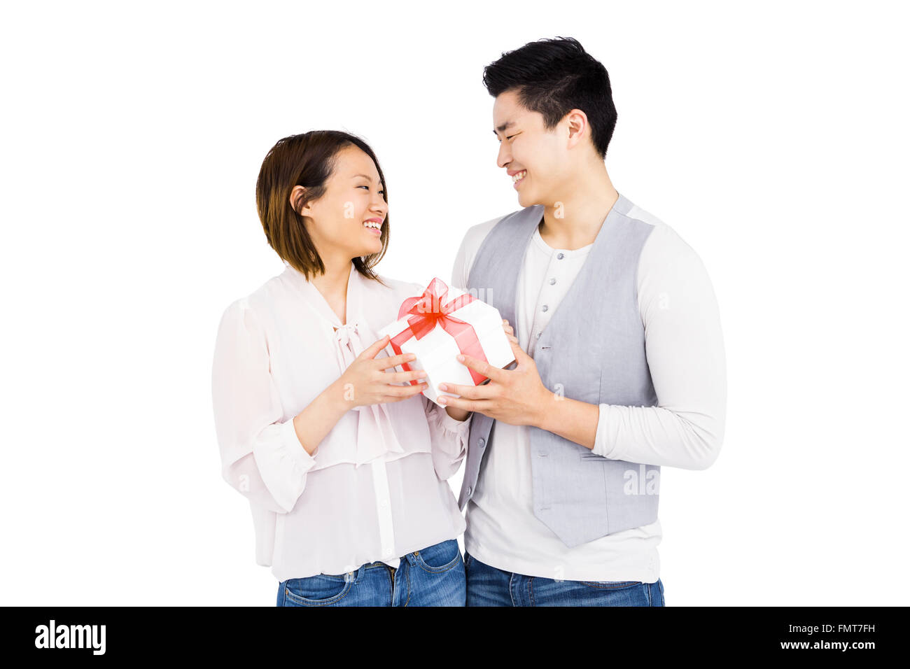Pretty young woman giving present hi-res stock photography and images ...
