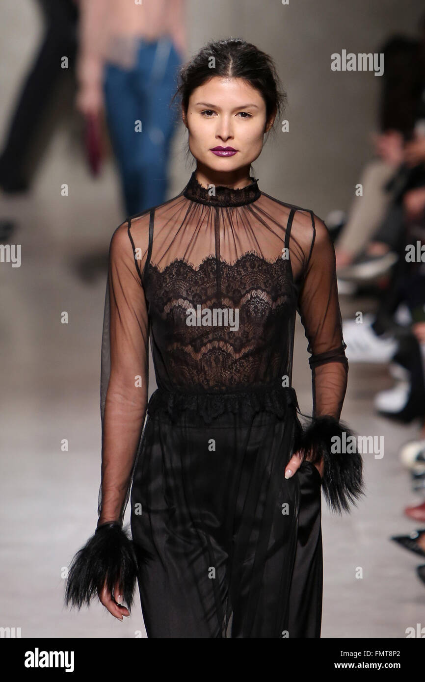 Lisbon, Portugal. 12th Mar, 2016. A model presents a creation from the ...
