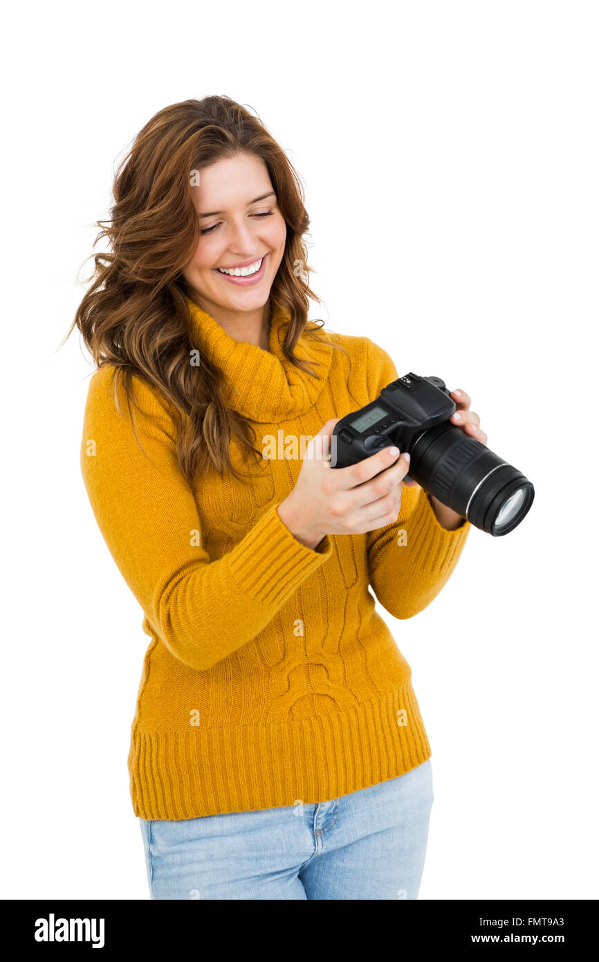 Young woman using camera Stock Photo - Alamy