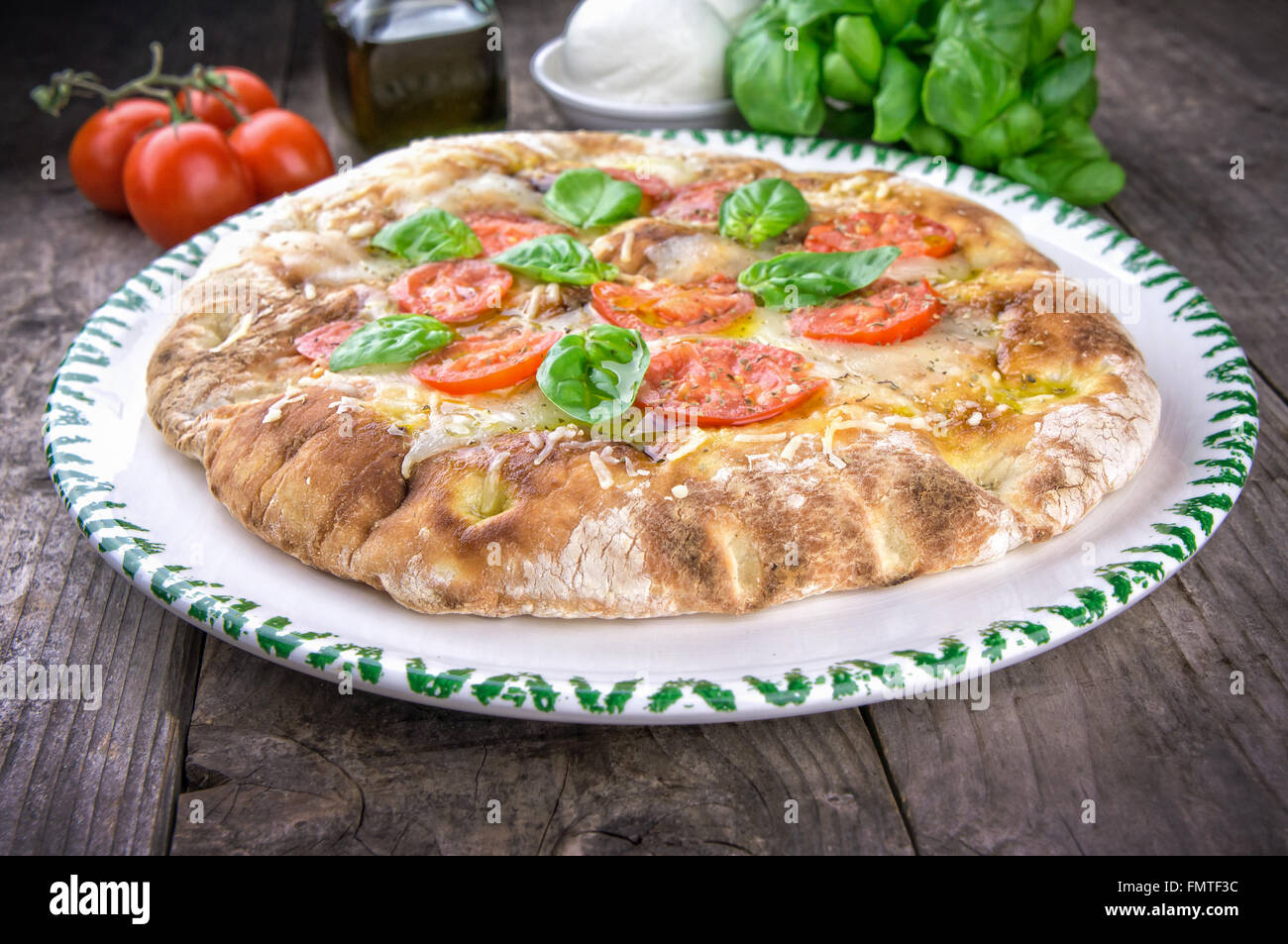 Organic pizza with fresh tomatoes Stock Photo - Alamy