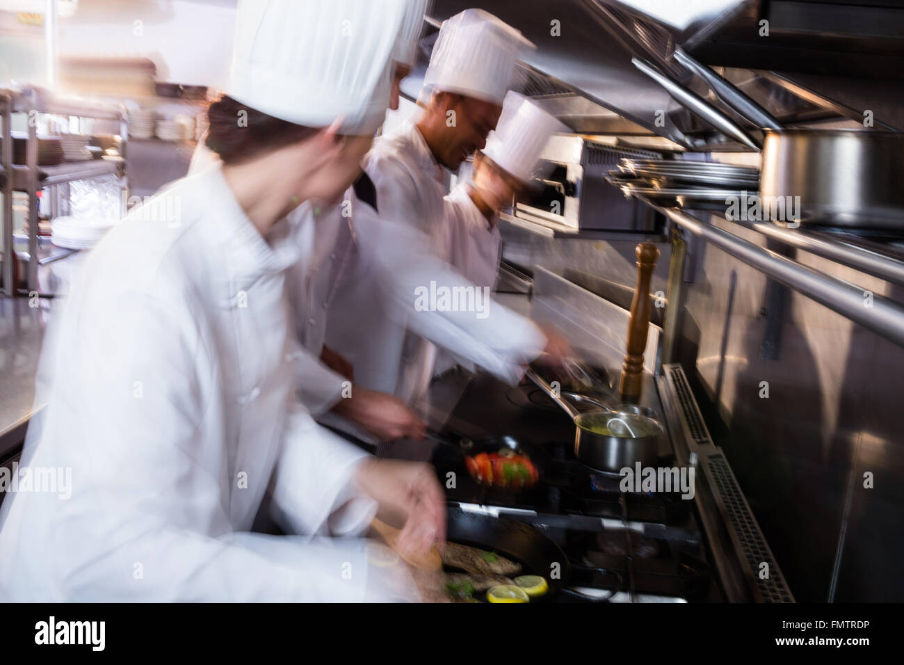 Professional chef frying fish hi-res stock photography and images - Alamy