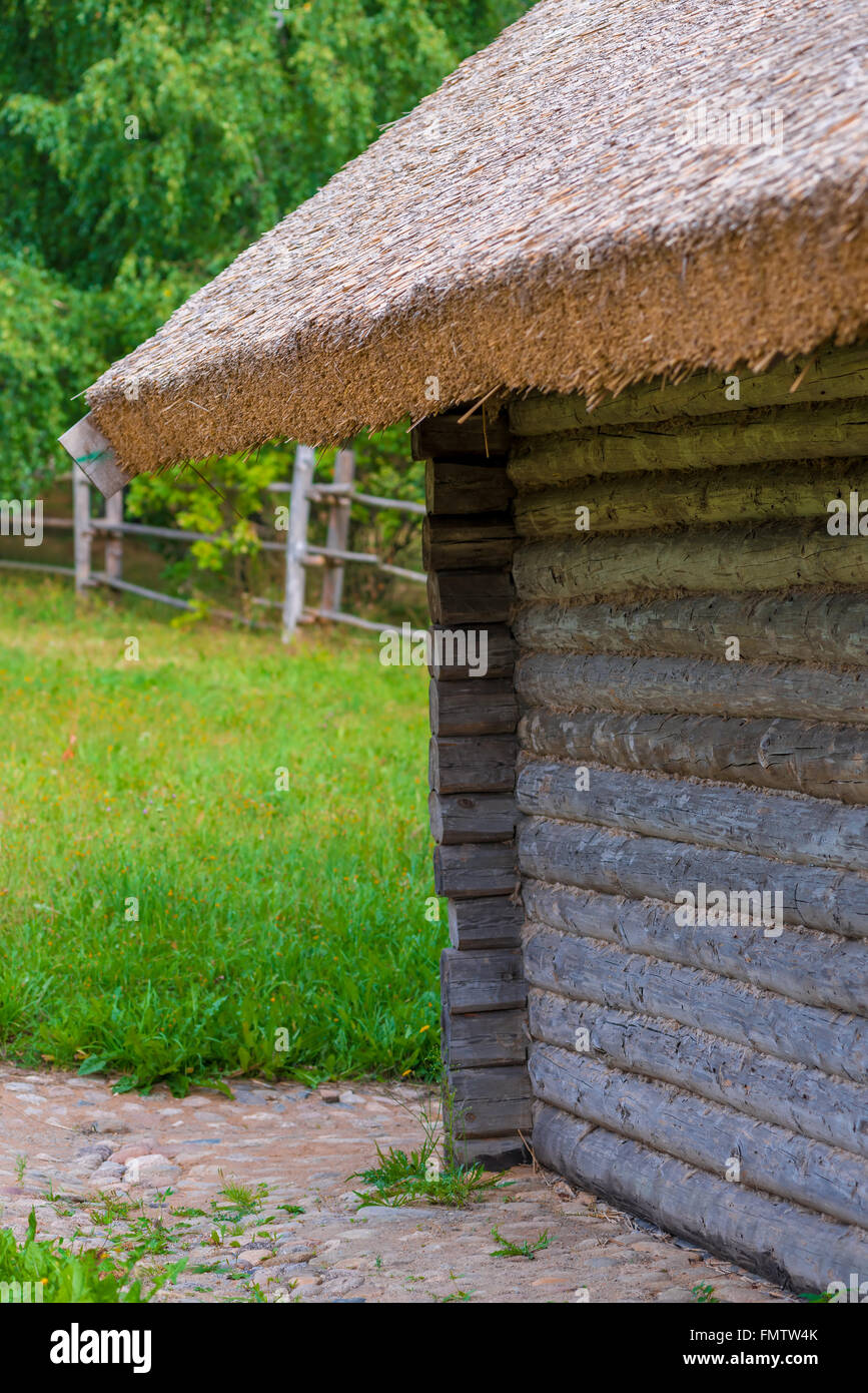 wooden shed in the countryside, thatched roof Stock Photo - Alamy