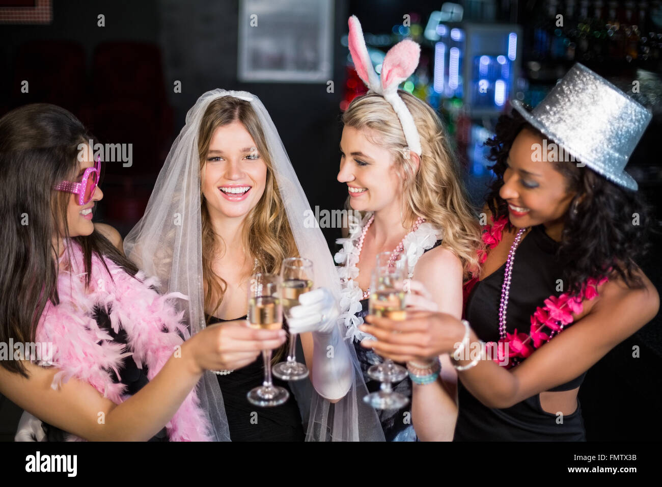 Friends celebrating bachelorette party Stock Photo - Alamy