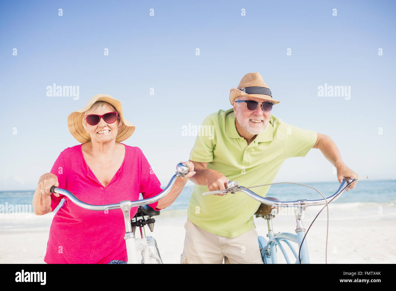 Senior couple going for a bike ride Stock Photo - Alamy