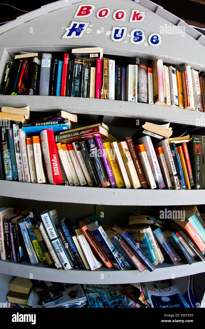 Stack of books in a resort in Thailand. Take a new book against your ...