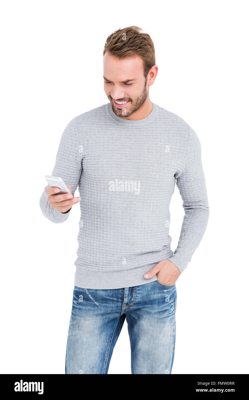 Young man using mobile phone Stock Photo - Alamy