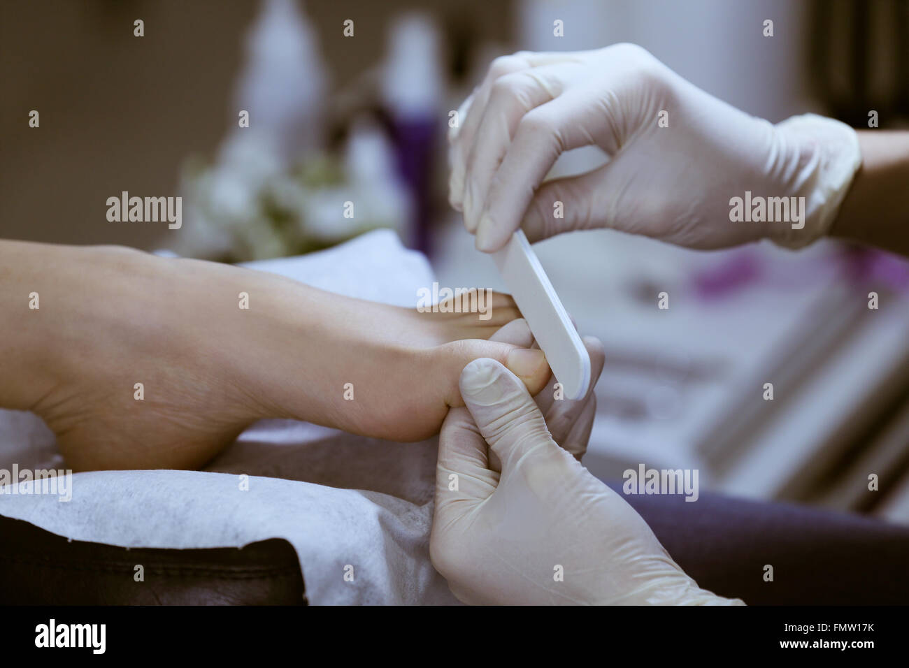 Side view of a gash toenails in salon Stock Photo - Alamy