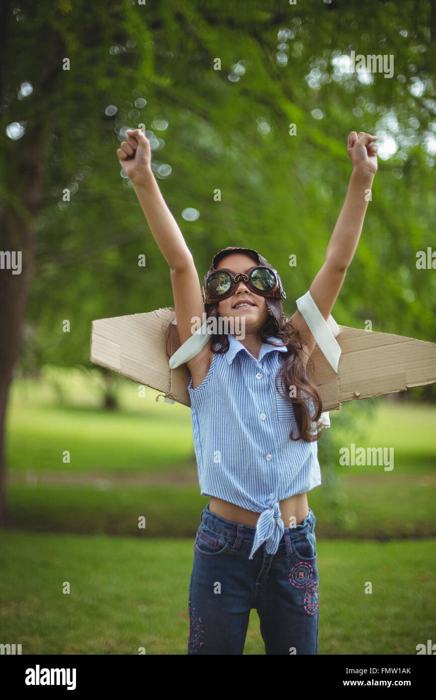 Young girl pretending to fly Stock Photo - Alamy