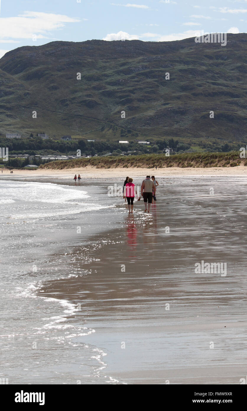 People on the beach at Stocker Strand (Ballymastocker Beach), Port ...