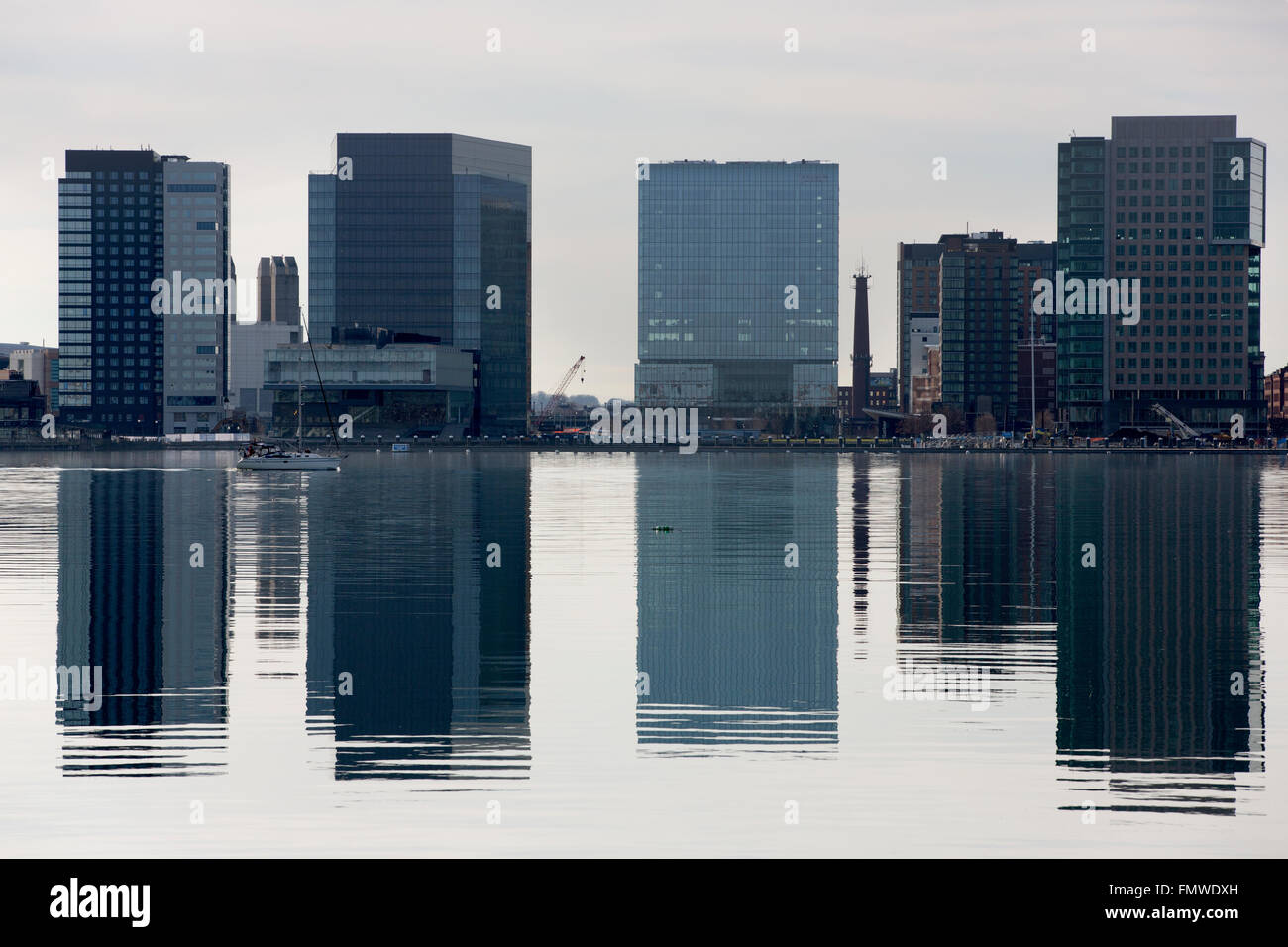 Boston Sea Port District office buildings reflected in Boston Harbor ...
