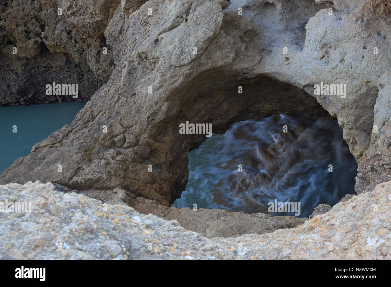 Caves near Malhada do Baraco Beach in Lagoa, Algarve, Portugal Stock ...