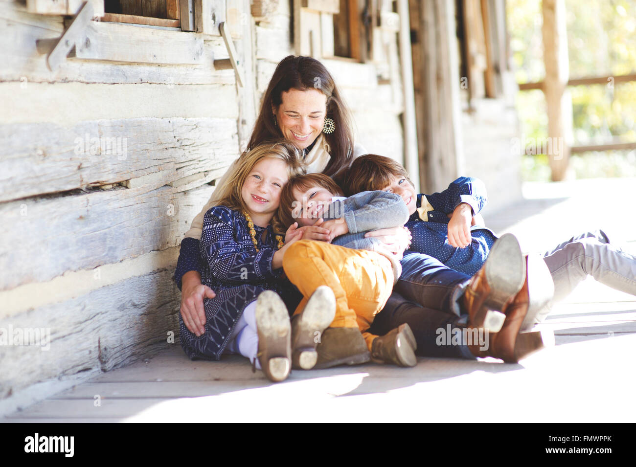Mother and children Stock Photo - Alamy